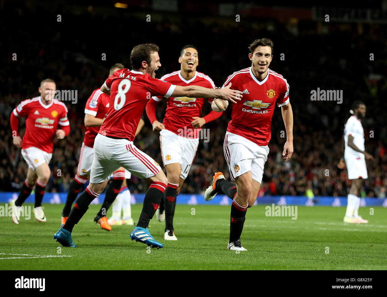 Manchester United's Matteo Darmian (right) celebrates scoring his side ...