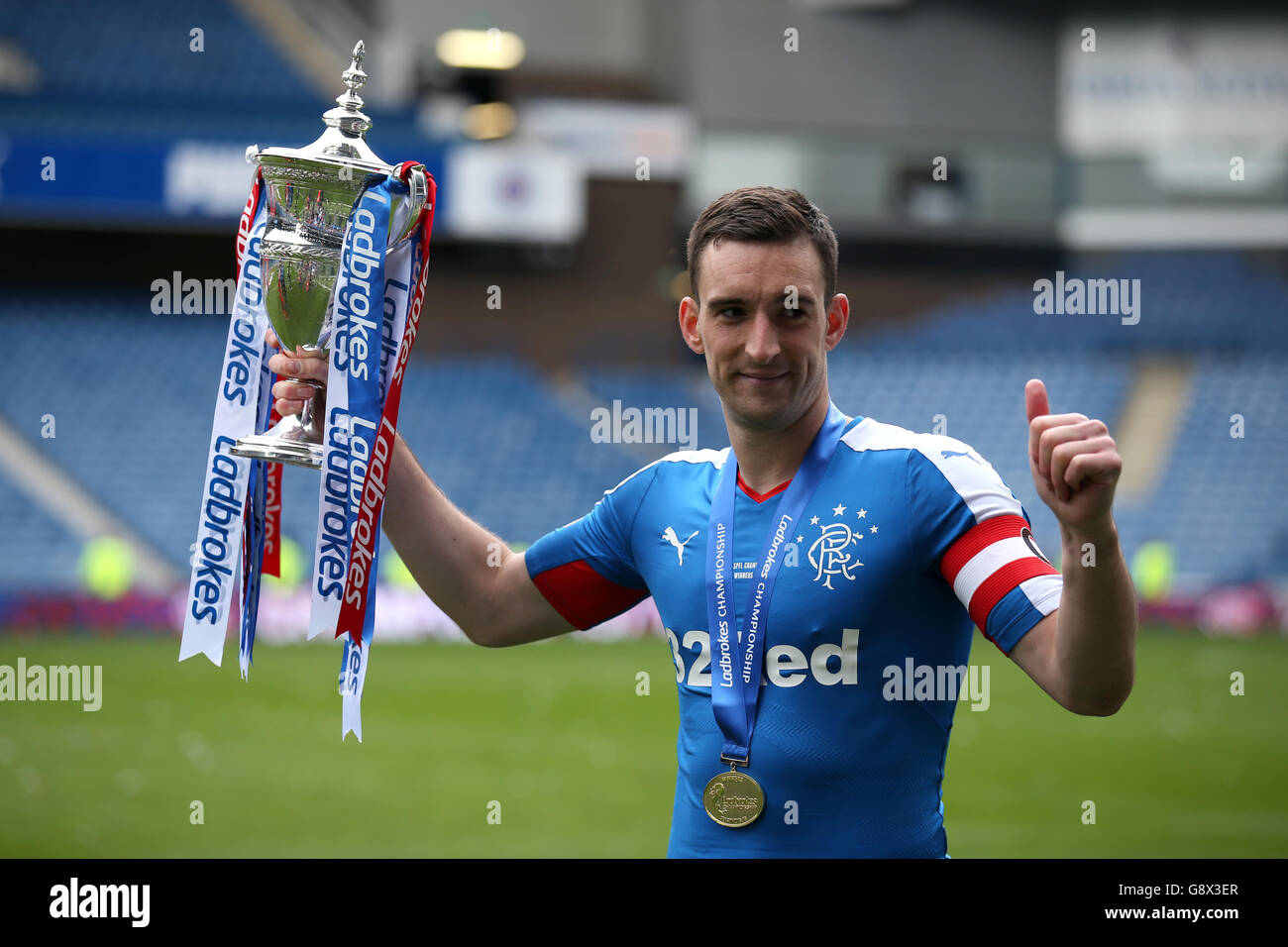 Rangers' Lee Wallace lifts the Ladbrokes Scottish Championship trophy ...