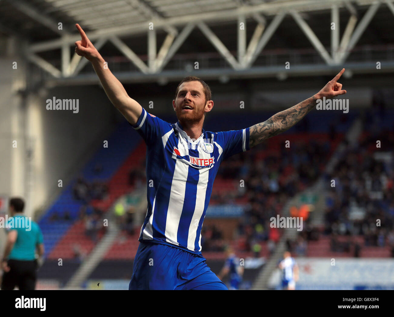Wigan Athletic's Chris McCann celebrates after he scores his sides ...