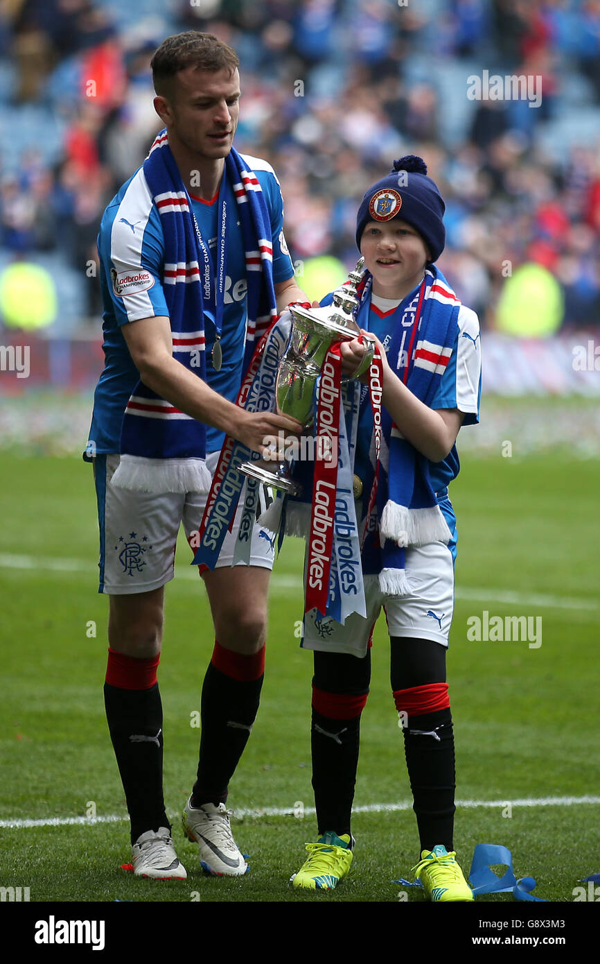 Rangers' Andy Halliday (left) with Matchday mascot Lee Welsh celebrates ...