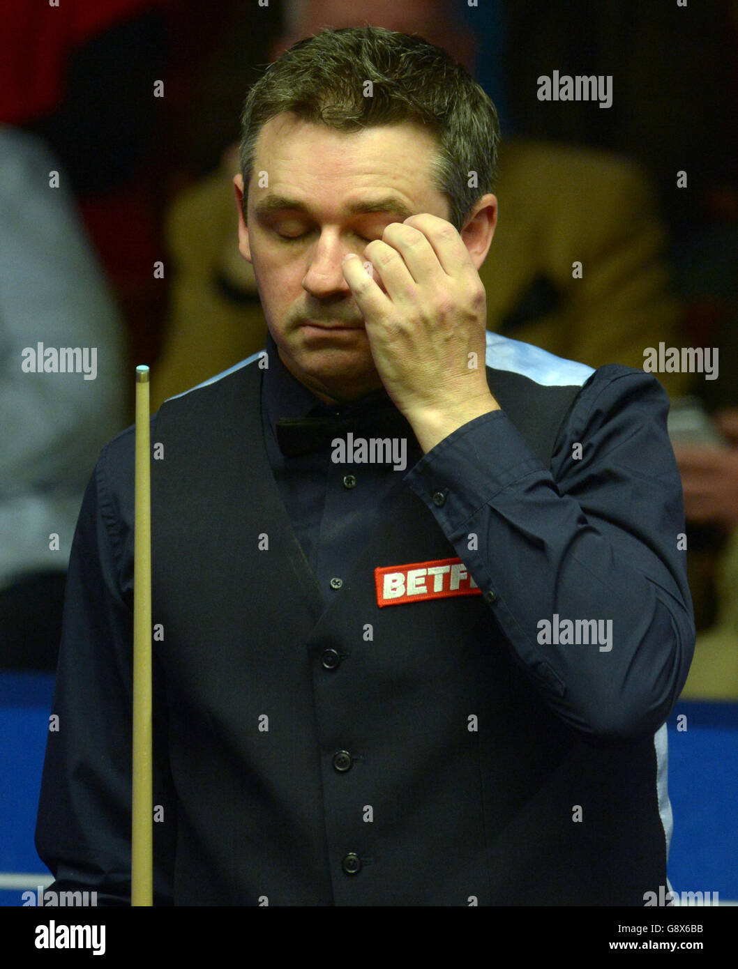 Alan McManus reacts in his match against John Higgins during day eleven ...
