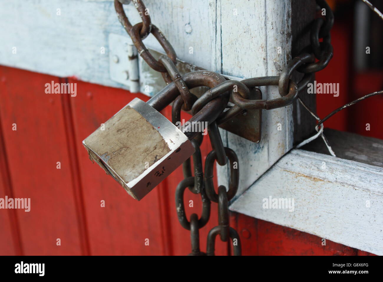 Padlock in chain hi-res stock photography and images - Alamy