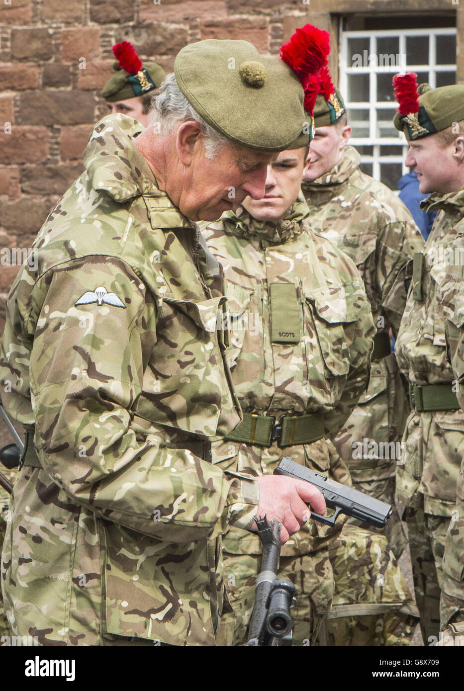 The Prince of Wales holds a Glock 17 (9mm General service pistol ...