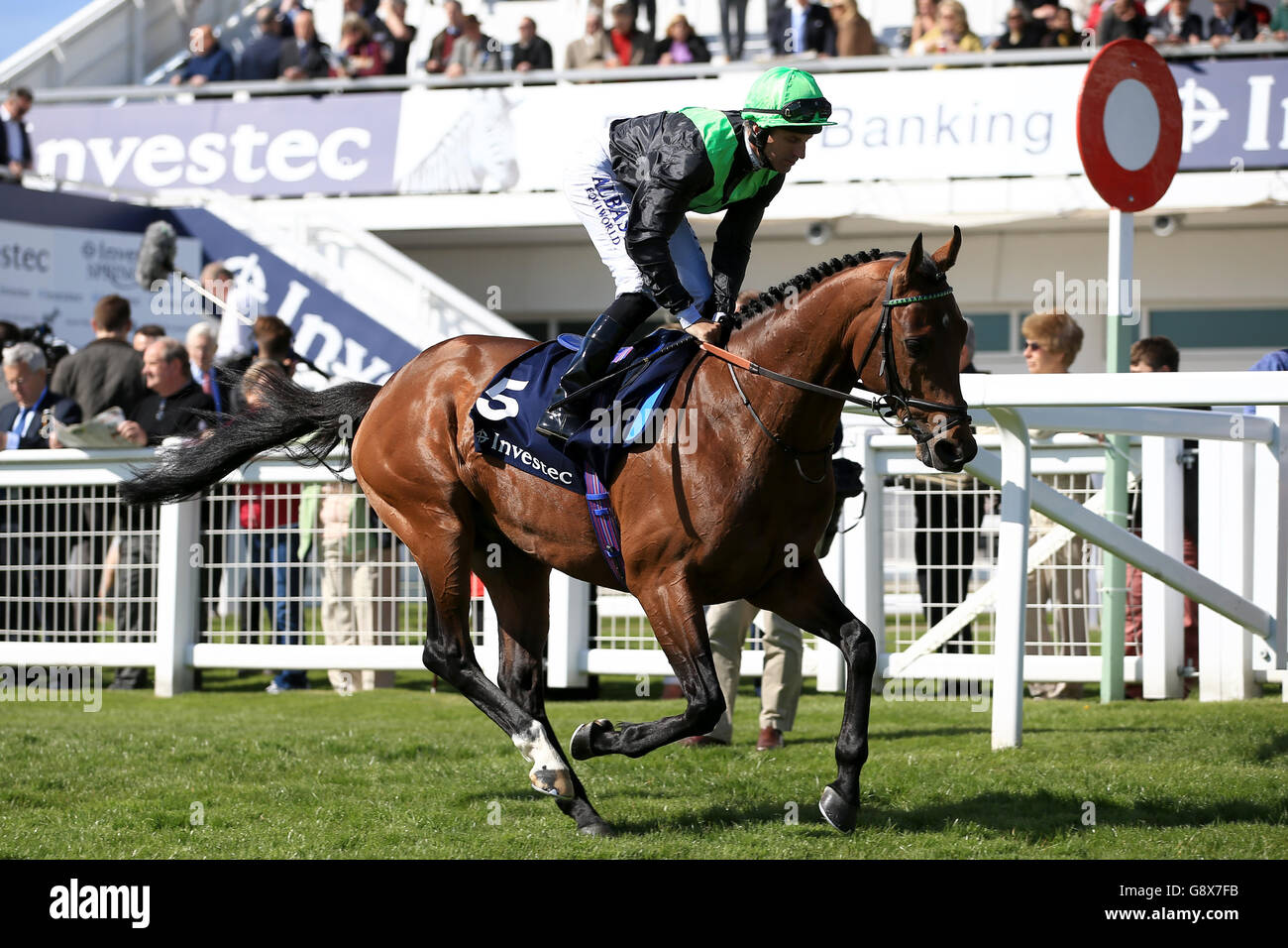 Epsom Races. Archangel Raphael ridden by jockey Pat Dobbs goes to post ...
