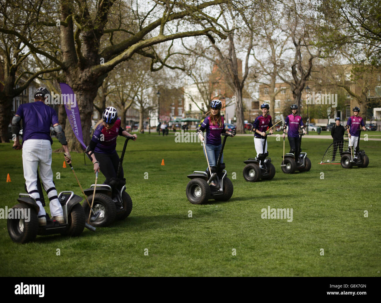 Players taking part in a Segway Polo Day at Parson's Green, London ...