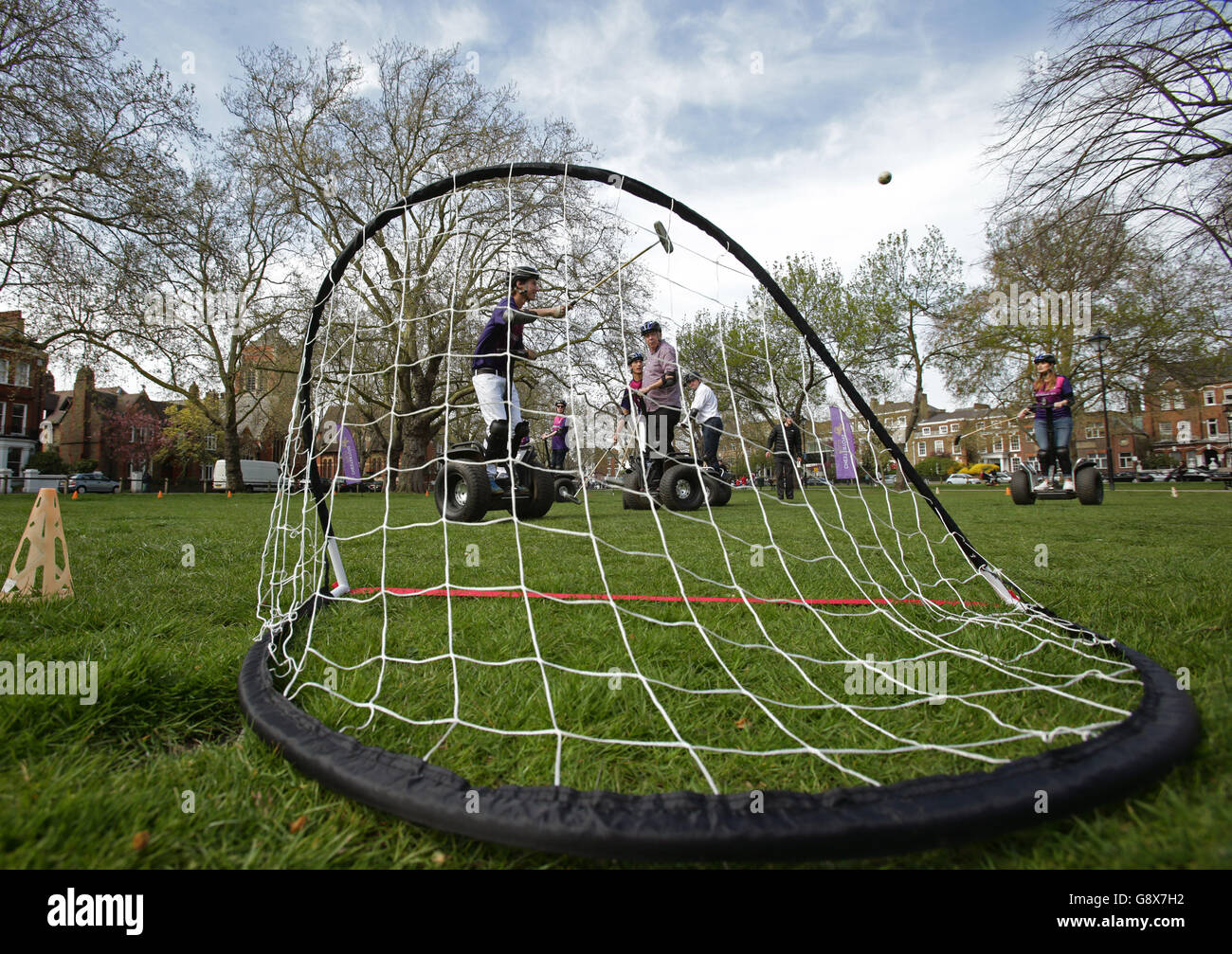 Players taking part in a Segway Polo Day at Parson's Green, London ...