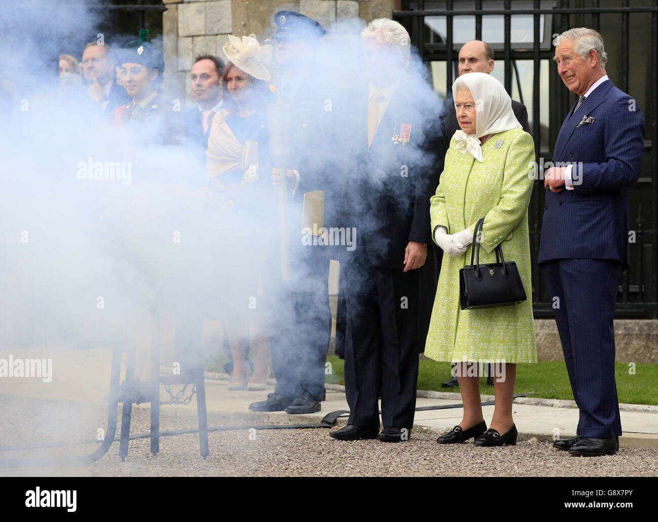 The Prince of Wales and Queen Elizabeth II attend a beacon lighting ...