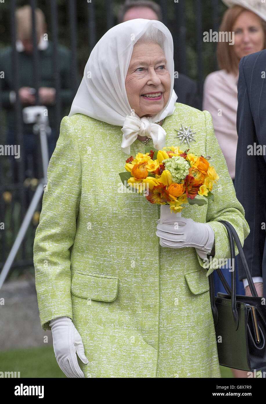 Queen Elizabeth II at Windsor Castle in Berkshire, as she lights a ...