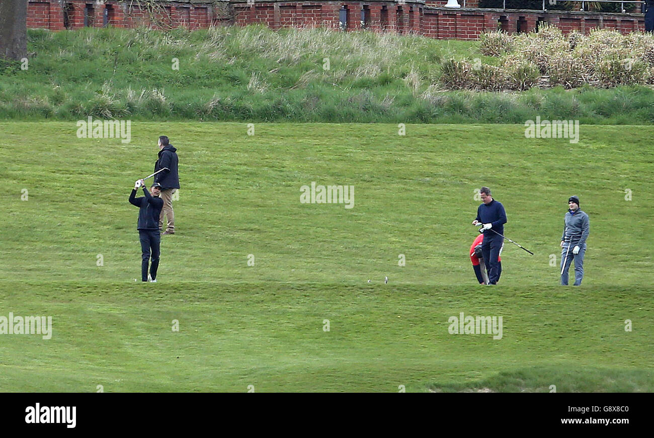 US President Barack Obama and Prime Minister David Cameron (right) play ...