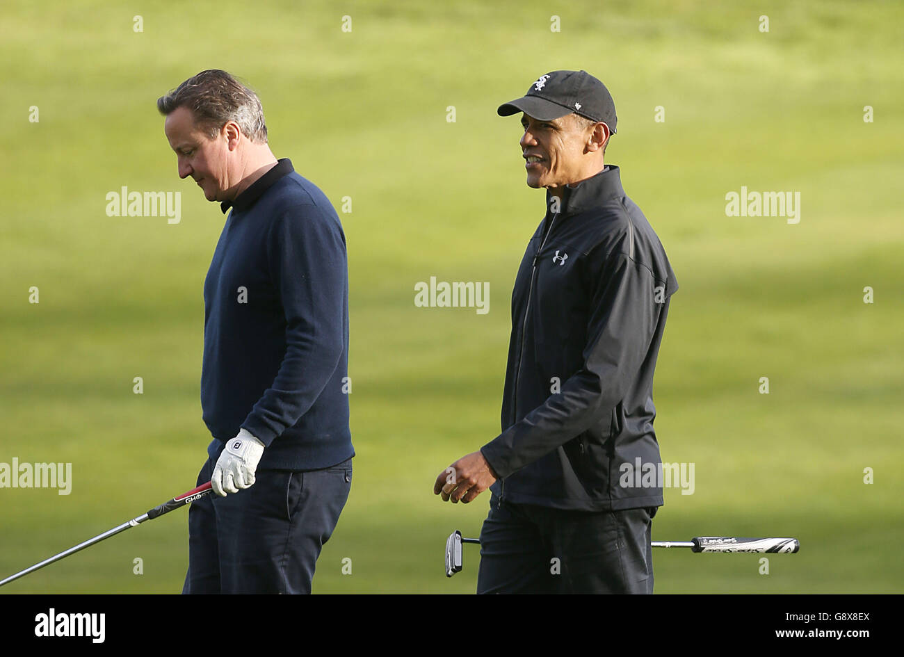 US President Barack Obama and Prime Minister David Cameron (left) play ...
