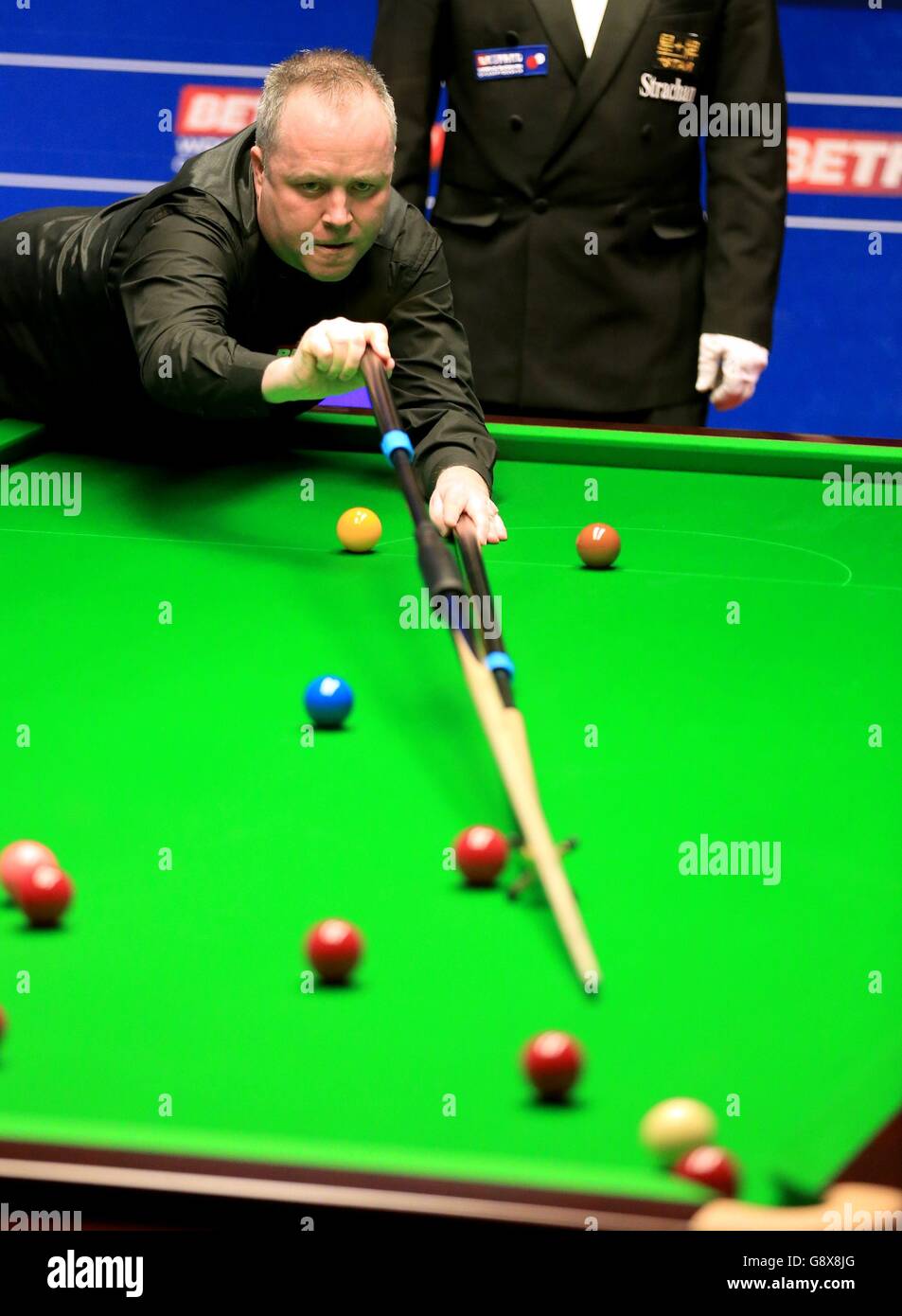 John Higgins during his match against Ricky Walden during day eight of ...
