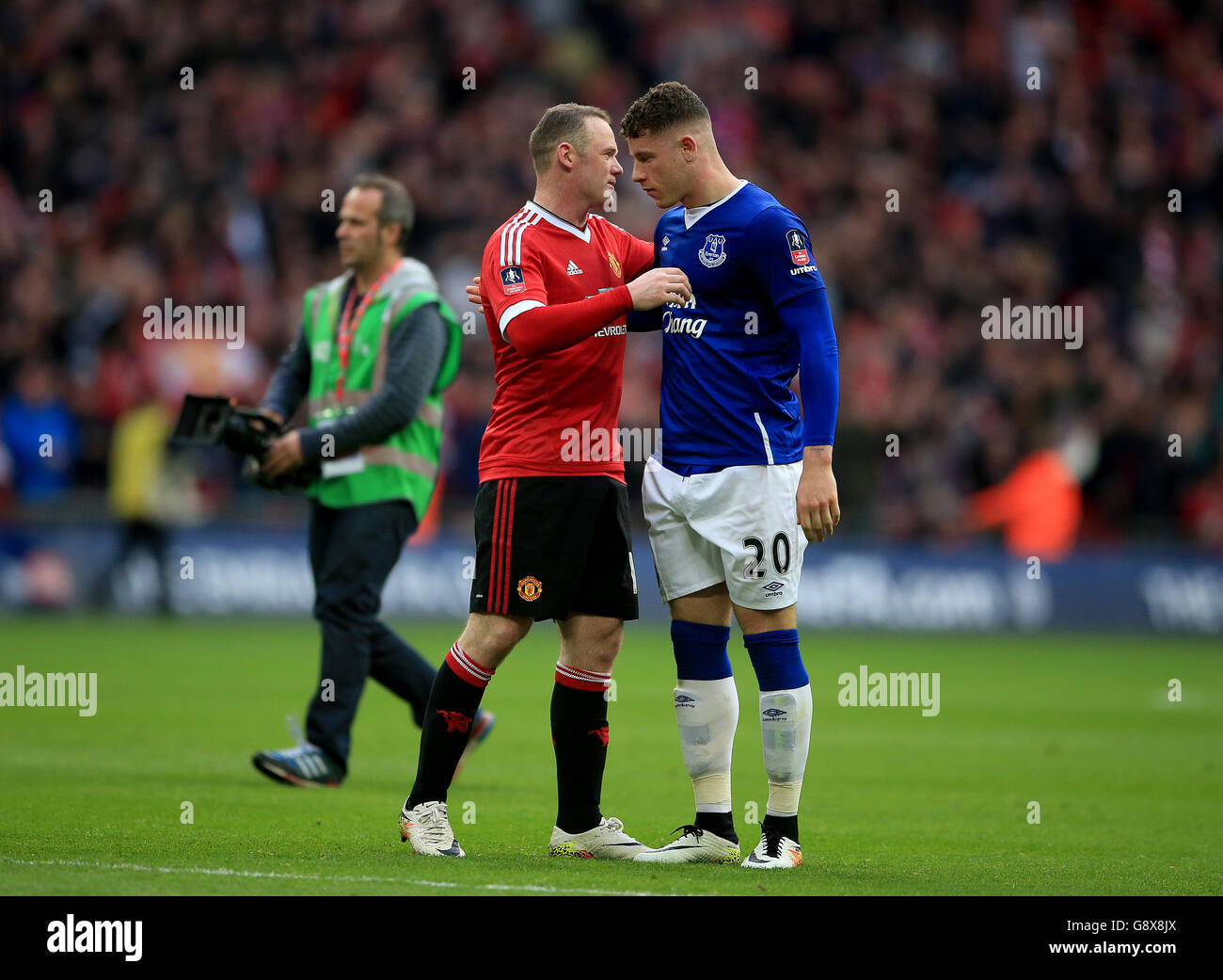 Everton's Ross Barkley (right) is consoled by Manchester United's Wayne ...