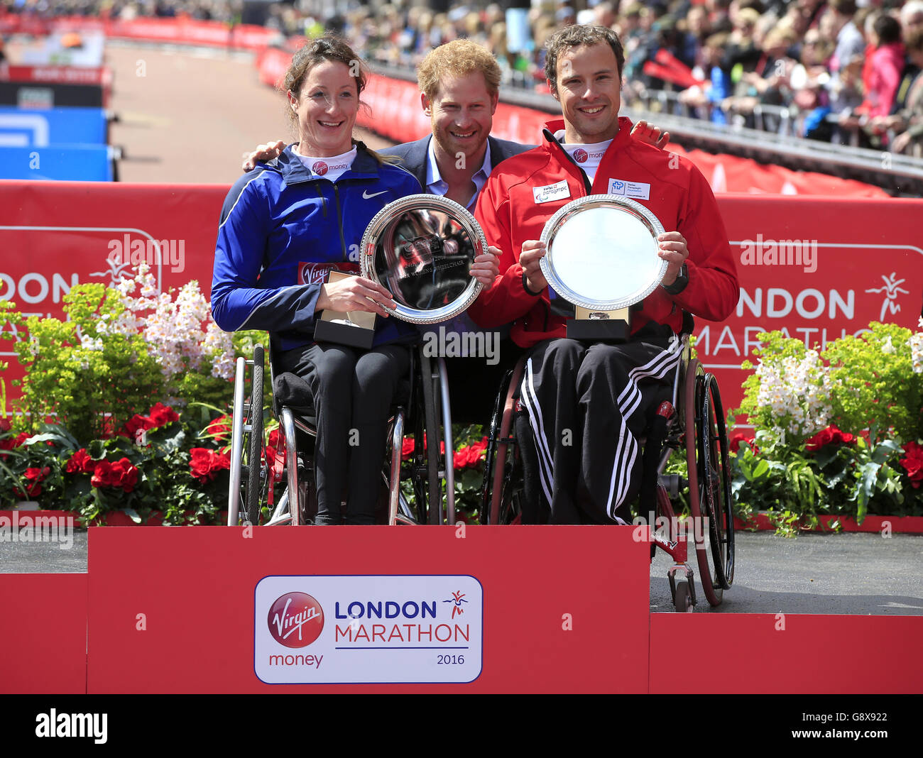 Prince Harry presents the gold medal trophies to Switzerland's Marcel ...