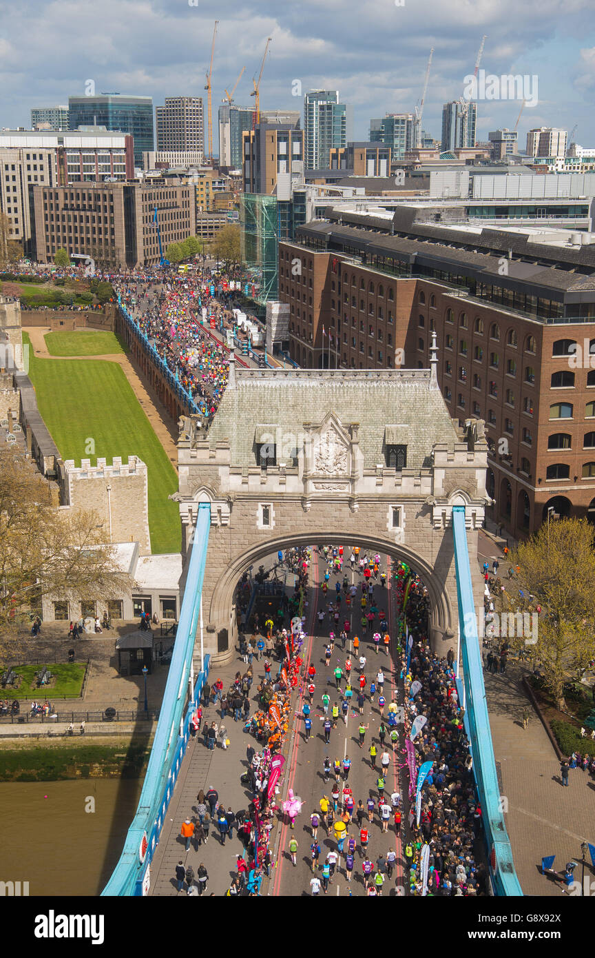 Runners cross Tower Bridge during the 2016 Virgin Money London Marathon ...