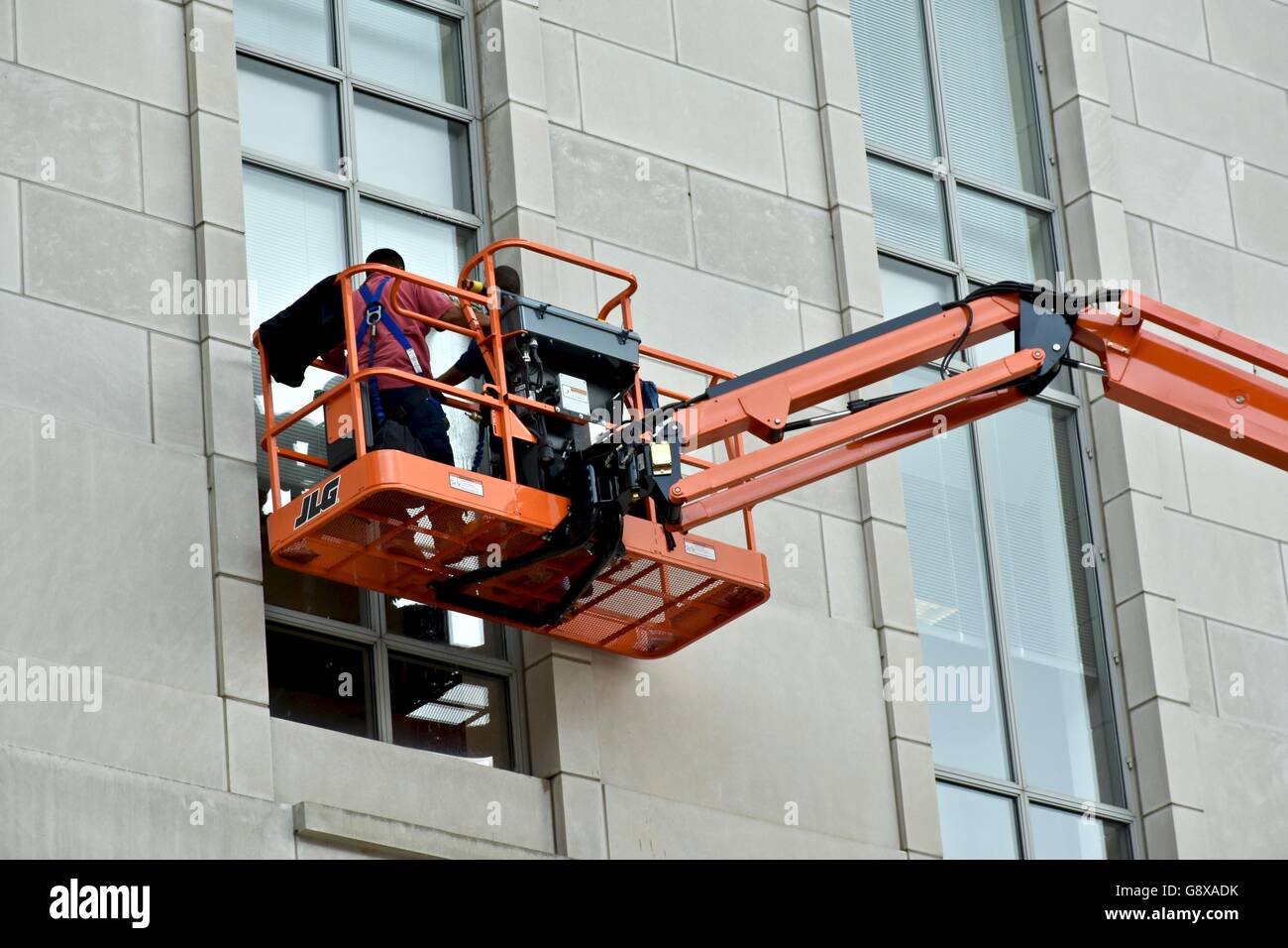 Two men cleaning windows hi-res stock photography and images - Alamy