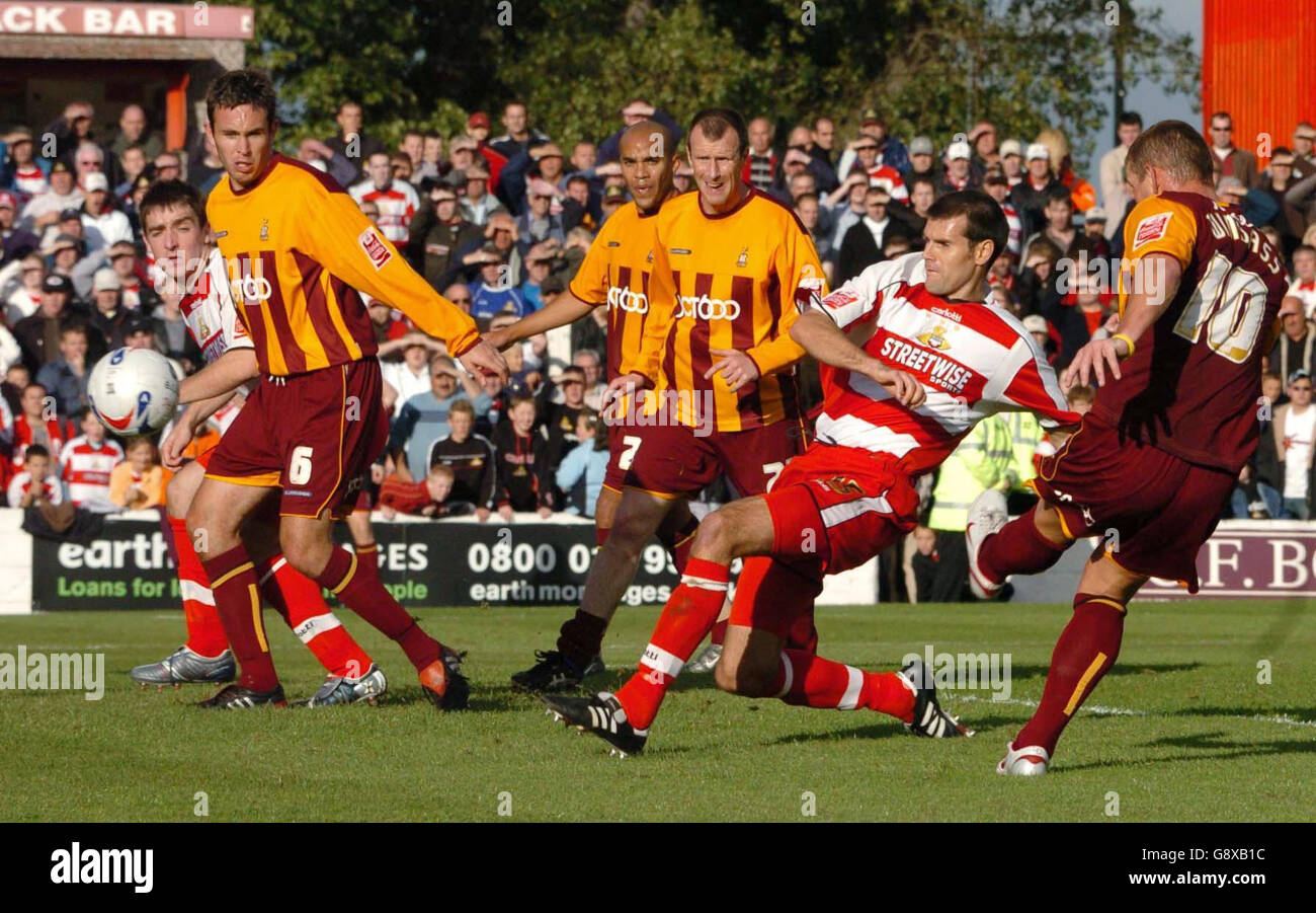 Doncaster Rovers' Nick Fenton (2nd from r) scores against Bradford ...