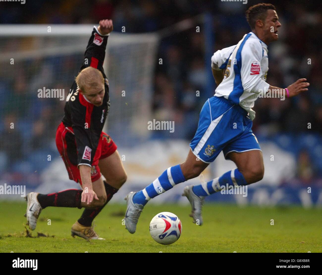 Burys simon whaley is caught lincoln citys paul mayo hi-res stock ...