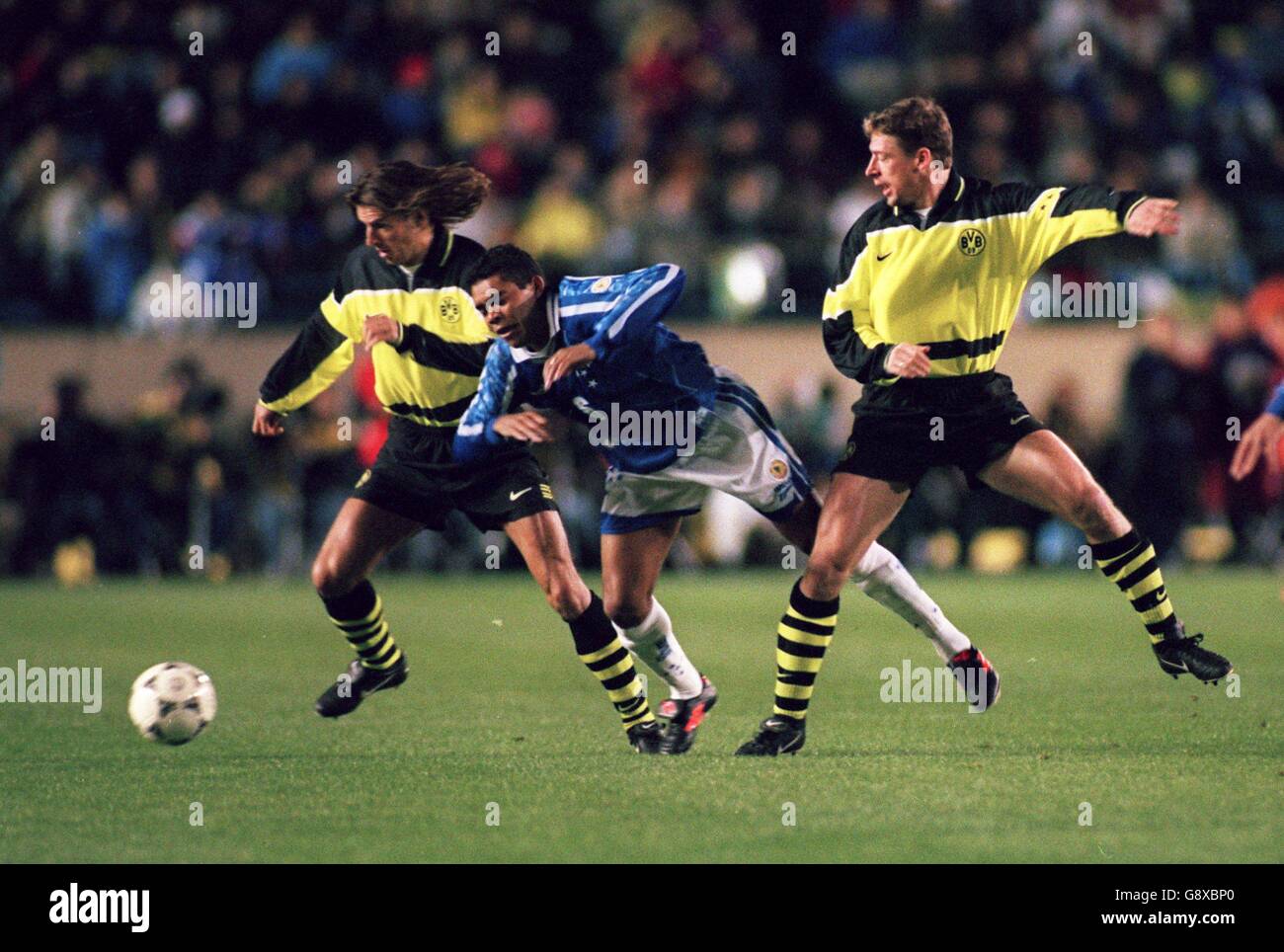 Borussia Dortmund's Paulo Sousa (left) and Steffen Freund (right) find ...