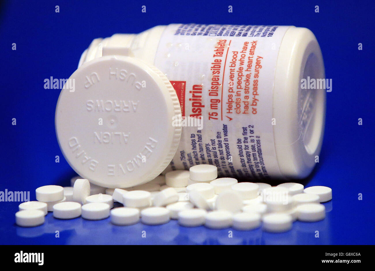 A general view of aspirin tablets and a bottle.. A general view of ...