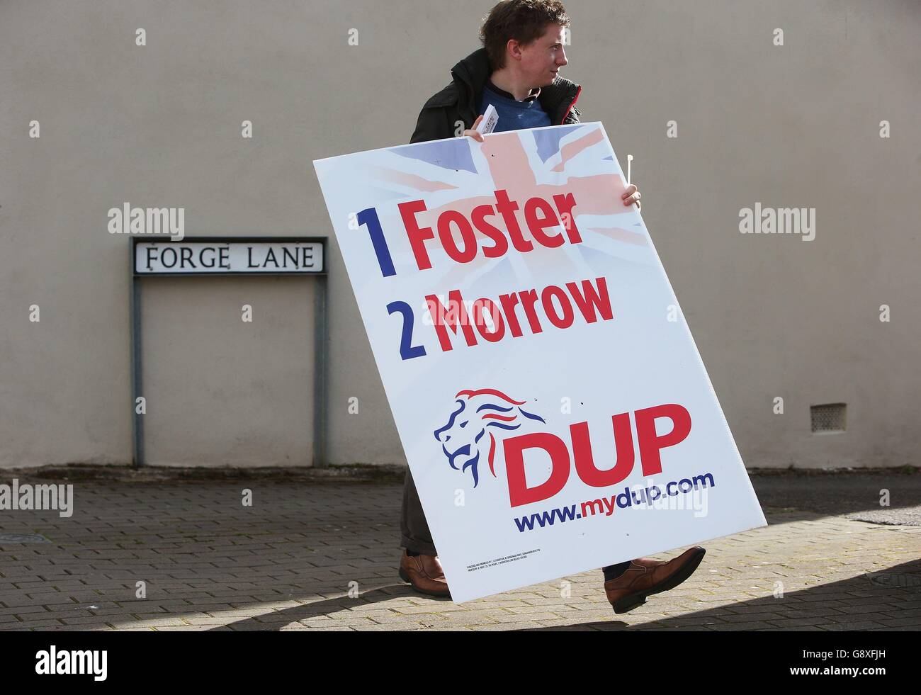 Poster assembly hi-res stock photography and images - Alamy