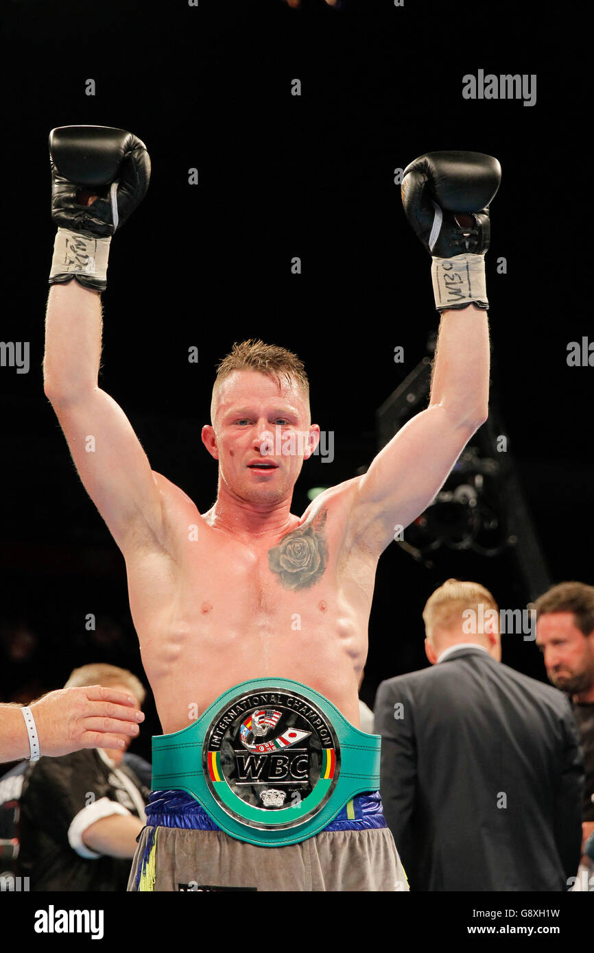 Shayne Singleton celebrates beating Adil Anwar in the WBC International ...
