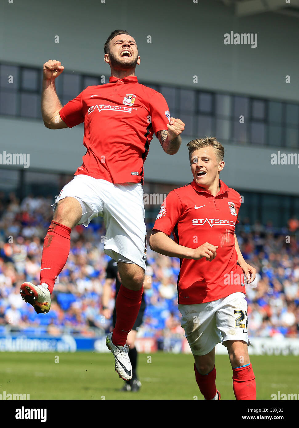 Coventry City's Adam Armstrong (Left) celebrates after he scores his ...