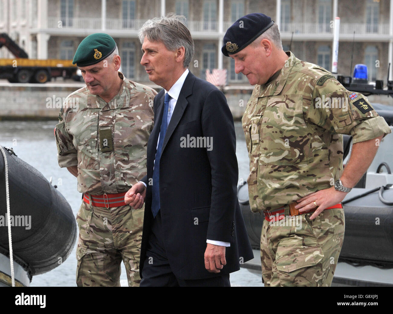 Foreign secretary philip hammond centre walks lieutenant general edward ...
