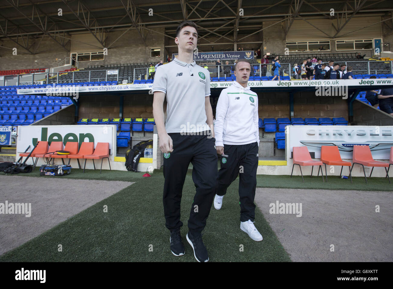 Celtic's Kieran Tierney (left) and Leigh Griffiths inspect the pitch ...