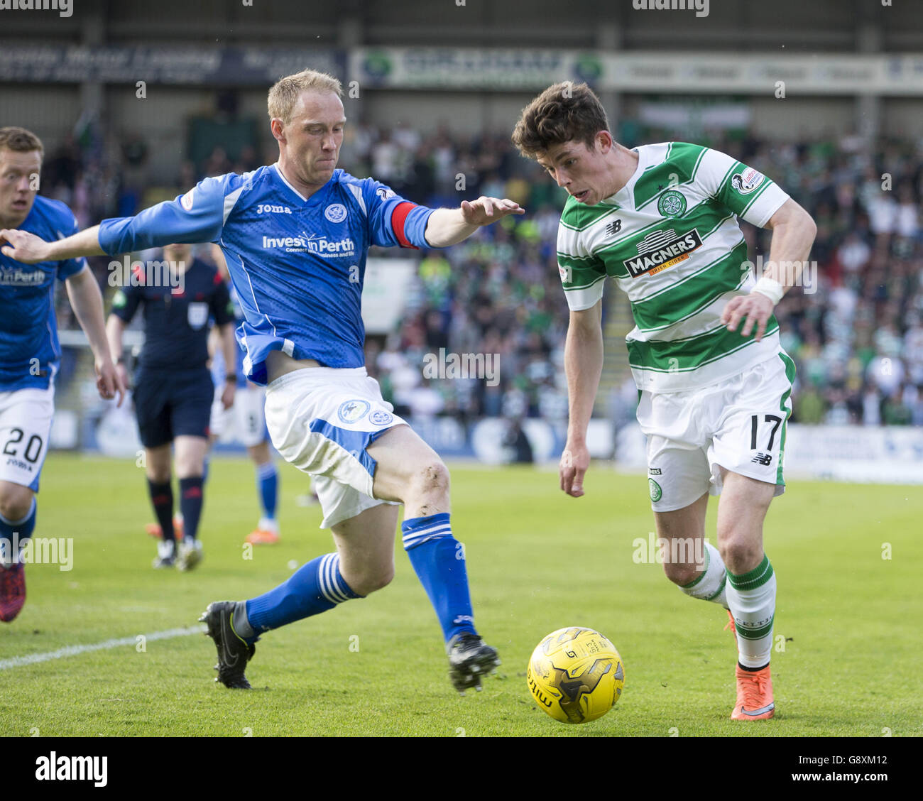 St Johnstone's Steven Anderson (left) and Celtic's Ryan Christie battle ...