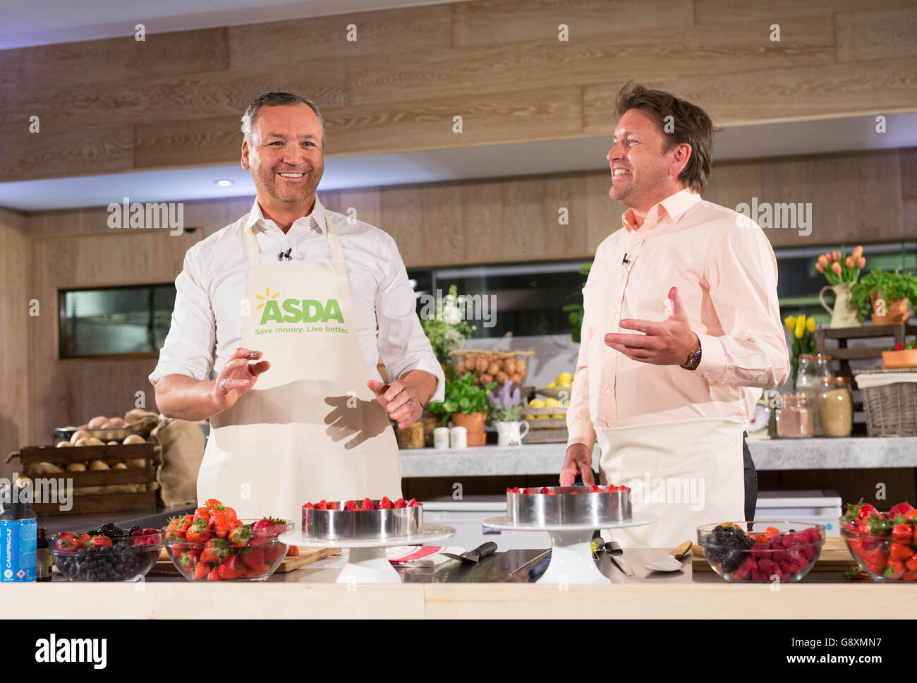 Andy Clarke, President and CEO Asda, and television chef James Martin ...