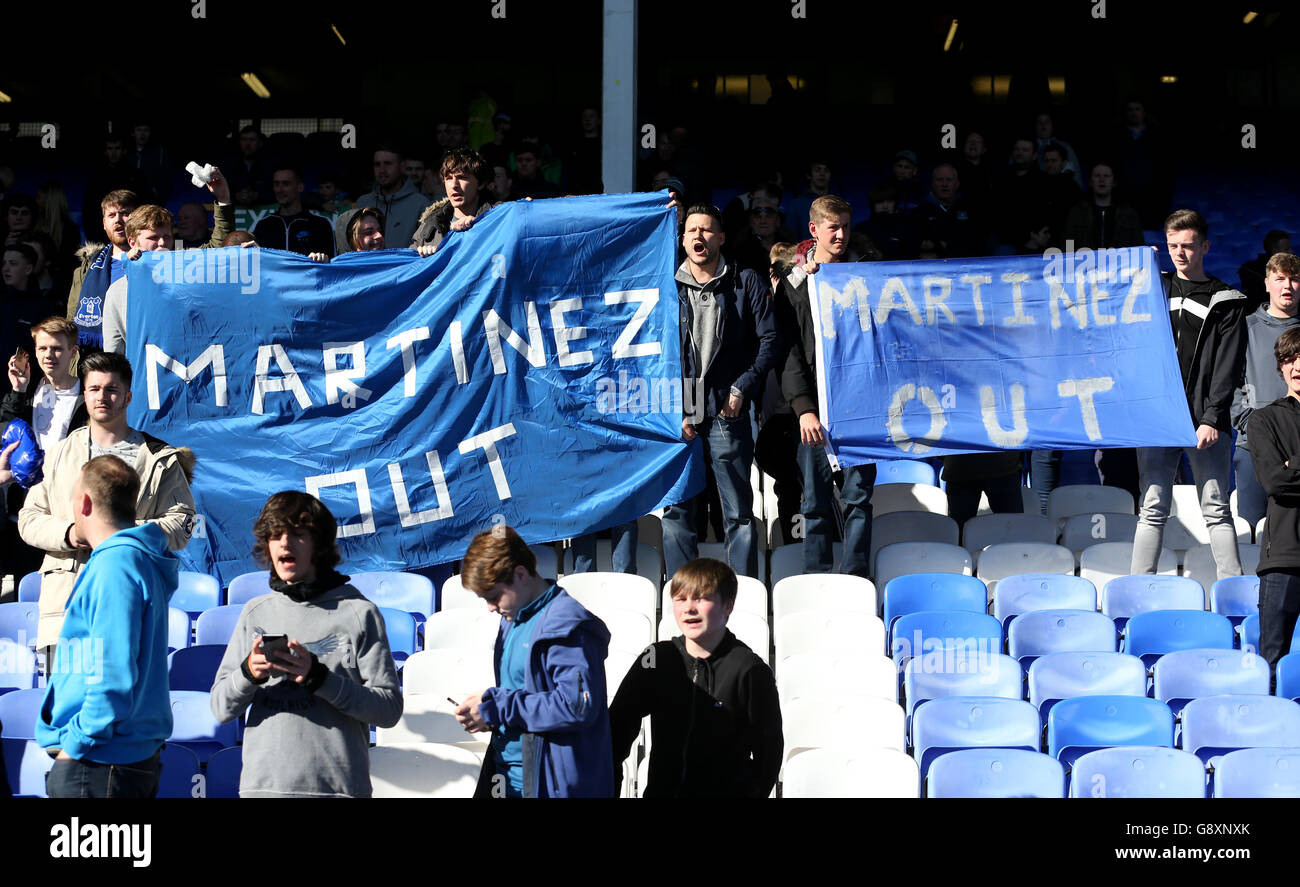Everton fans hold protest signs in the stands despite victory after the ...