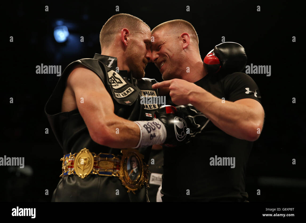 Ryan Walsh (left) celebrates victory over and James Tennyson during the ...