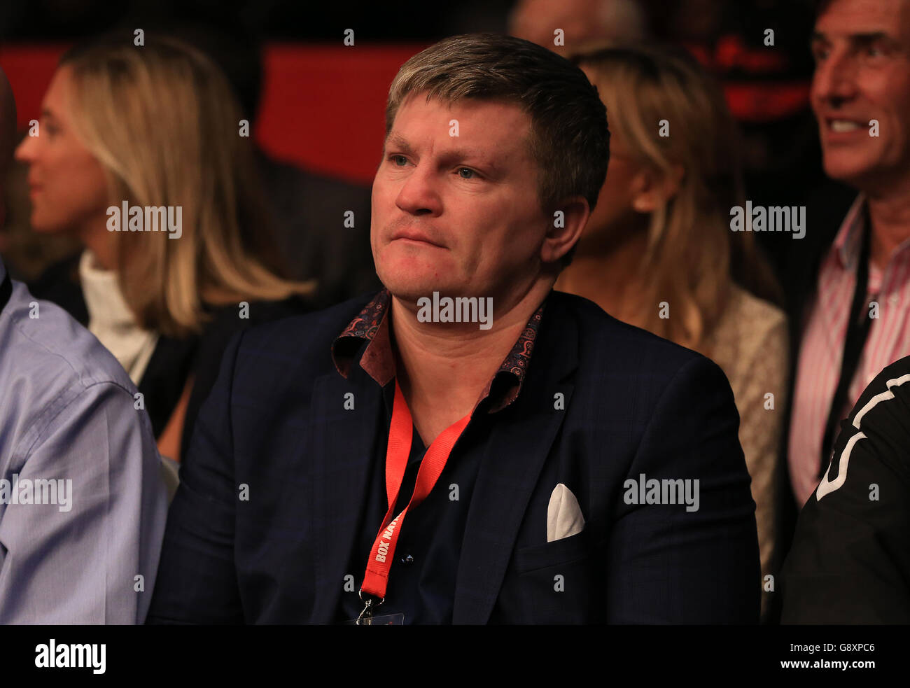 Ricky Hatton watches Ryan Walsh and James Tennyson during the British ...