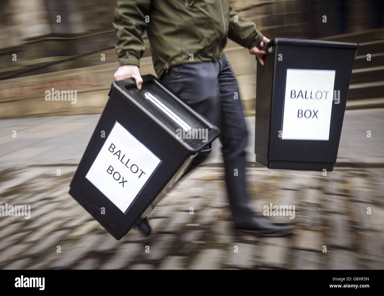 Ballot boxes are carried as Edinburgh council staff deliver signage and ...