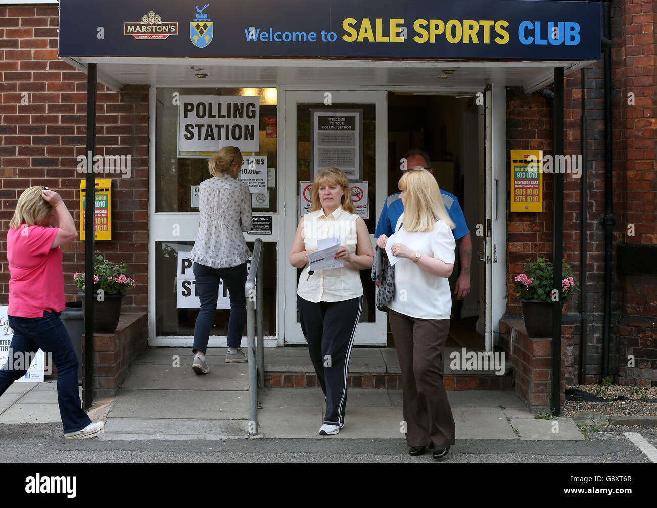 People at a polling station at Sale Sports Club, Sale, in Trafford ...