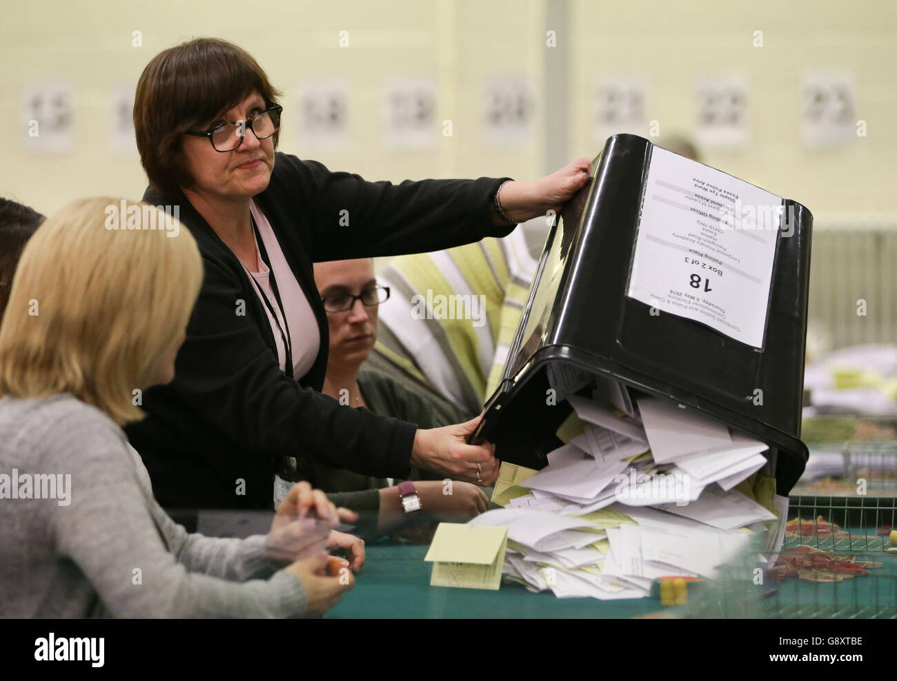 Count volunteers wait to count ballot papers at the Latton Bush Centre ...