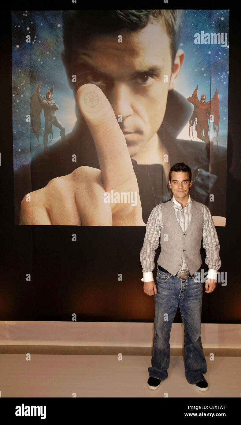 AP OUT: British pop star Robbie Williams during a photocall at ...