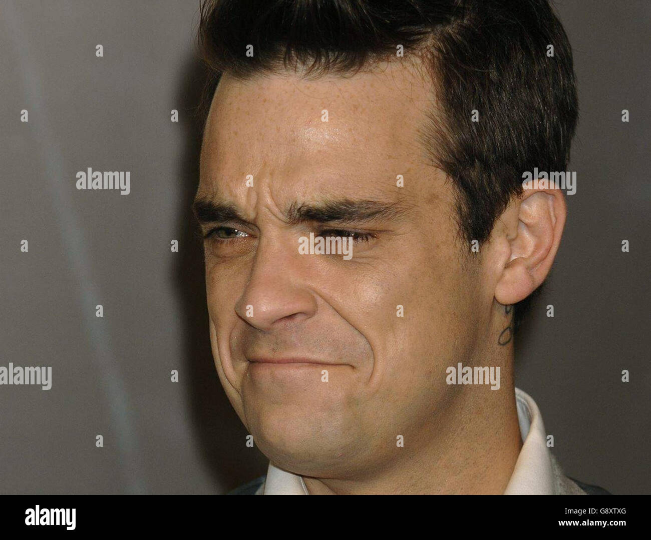 AP OUT: British pop star Robbie Williams during a photocall at ...