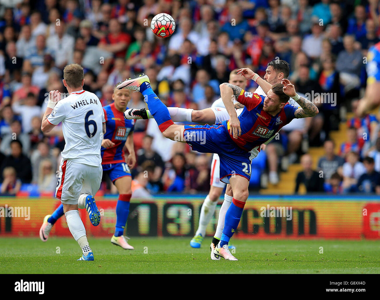 Crystal Palace's Connor Wickham and Stoke City's Geoff Cameron (back ...