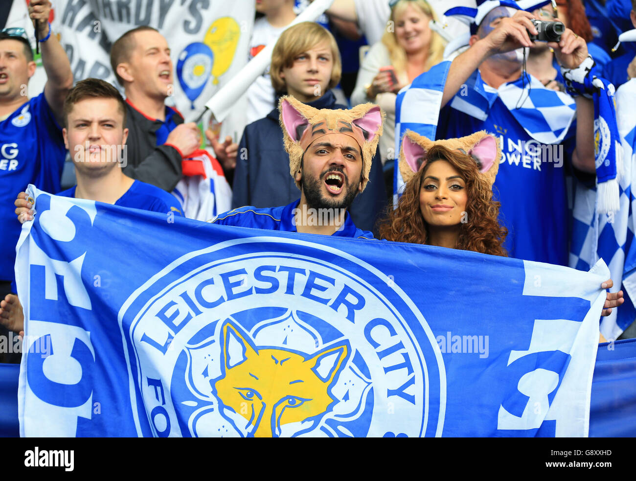 Leicester city fans in the stands show their support hi-res stock ...