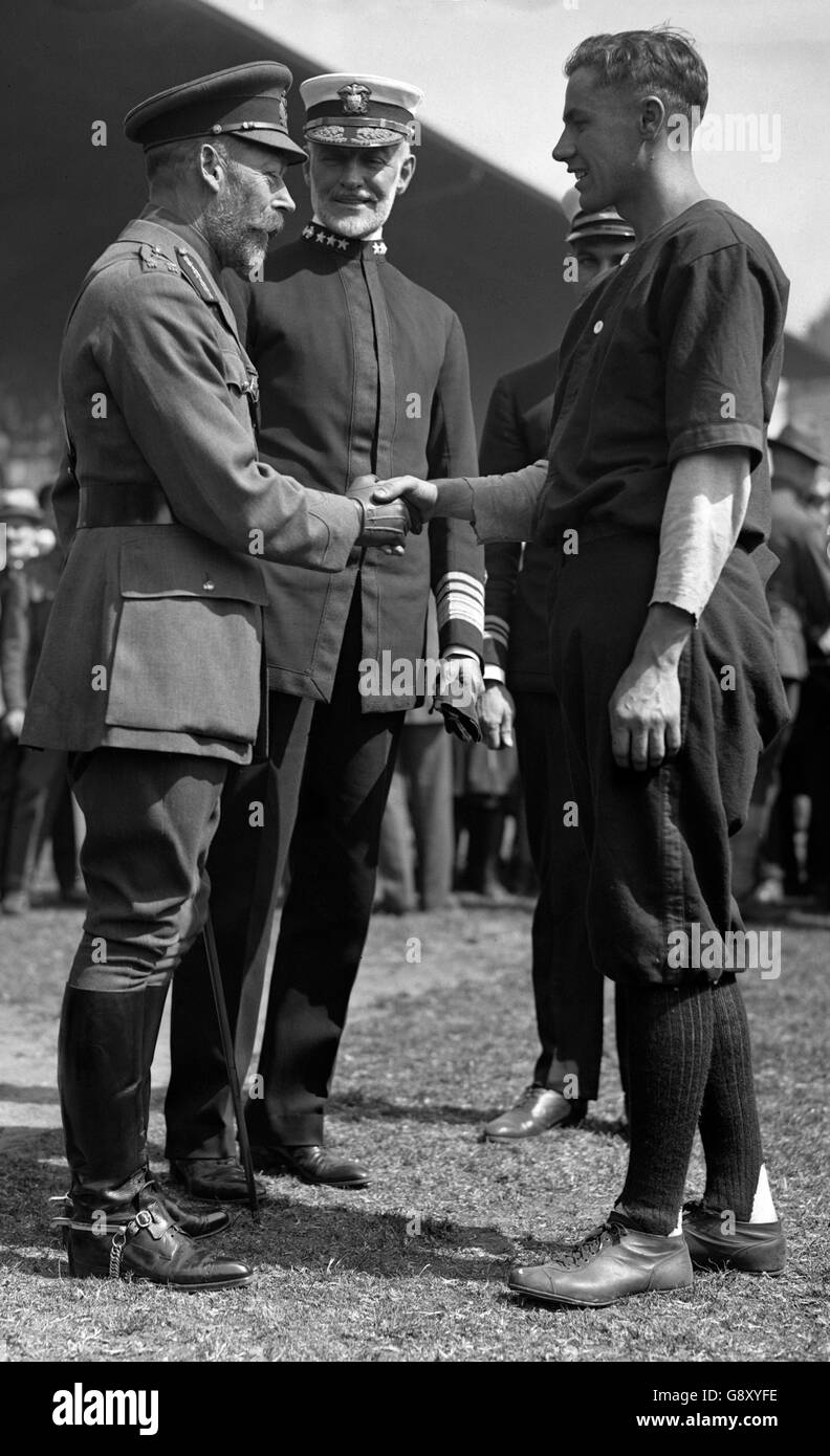 King George V shaking hands with the Chelsea baseball team captain ...