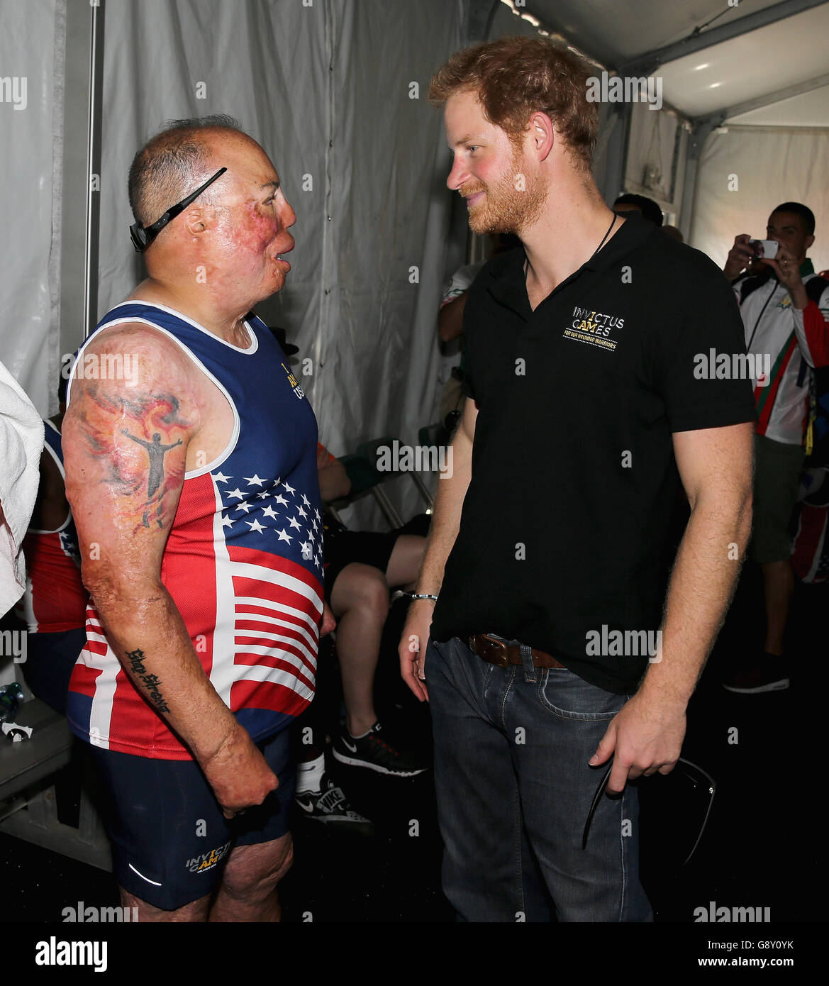 Prince Harry talks to American athlete Israel Del Toro during the Track ...