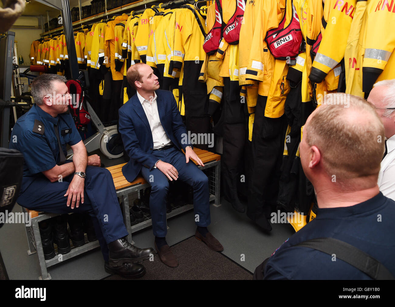 The Duke of Cambridge (second left) speaks to staff at the RNLI Tower ...