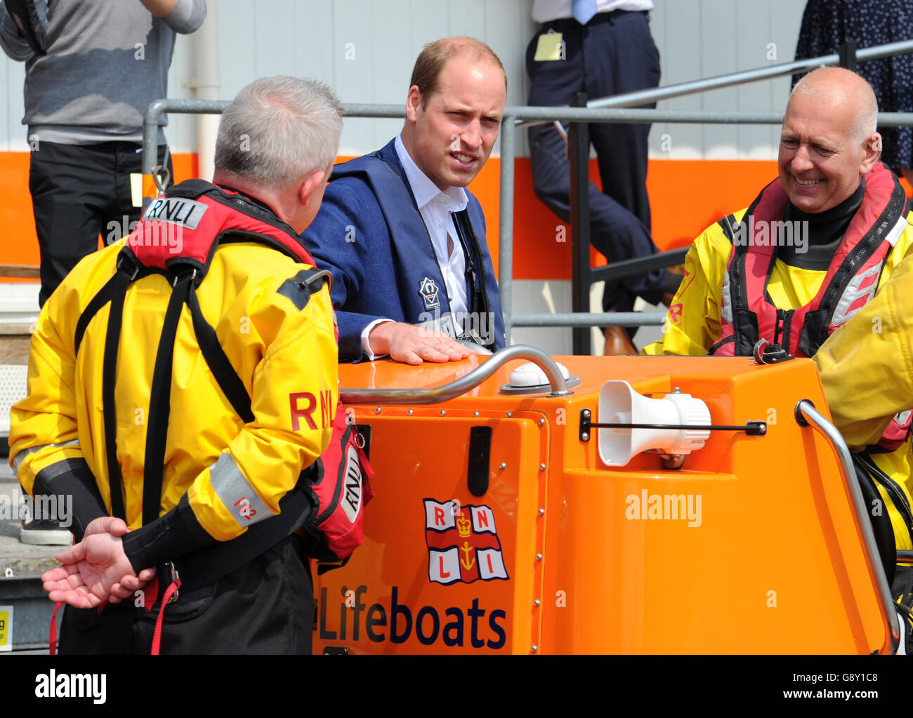 The Duke of Cambridge (centre) speaks to RNLI crew on board a RIB at ...