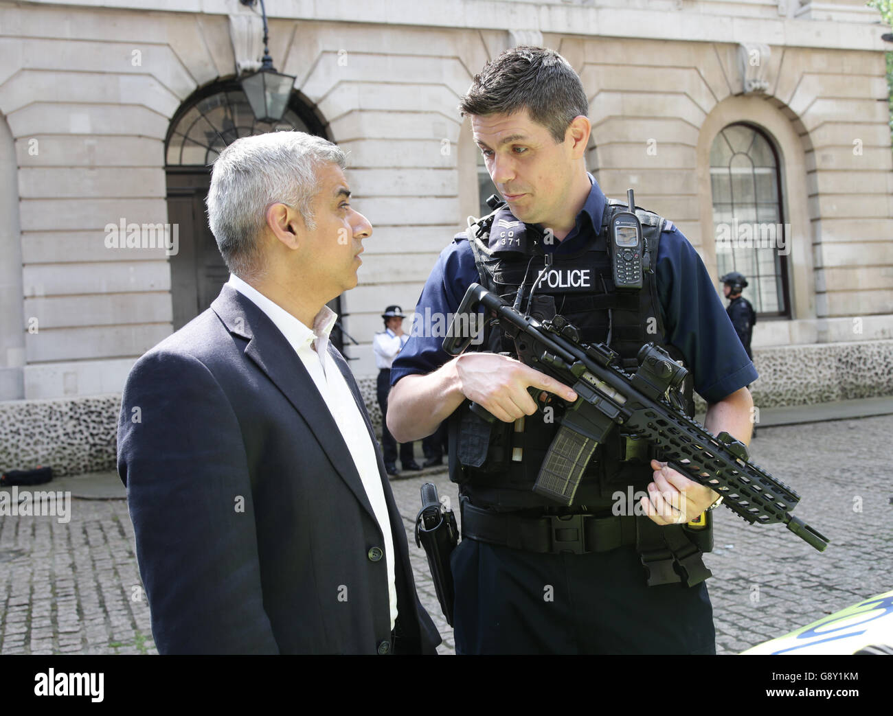 Mayor of London Sadiq Khan (left) with an ARV (Armed Vehicle Response ...
