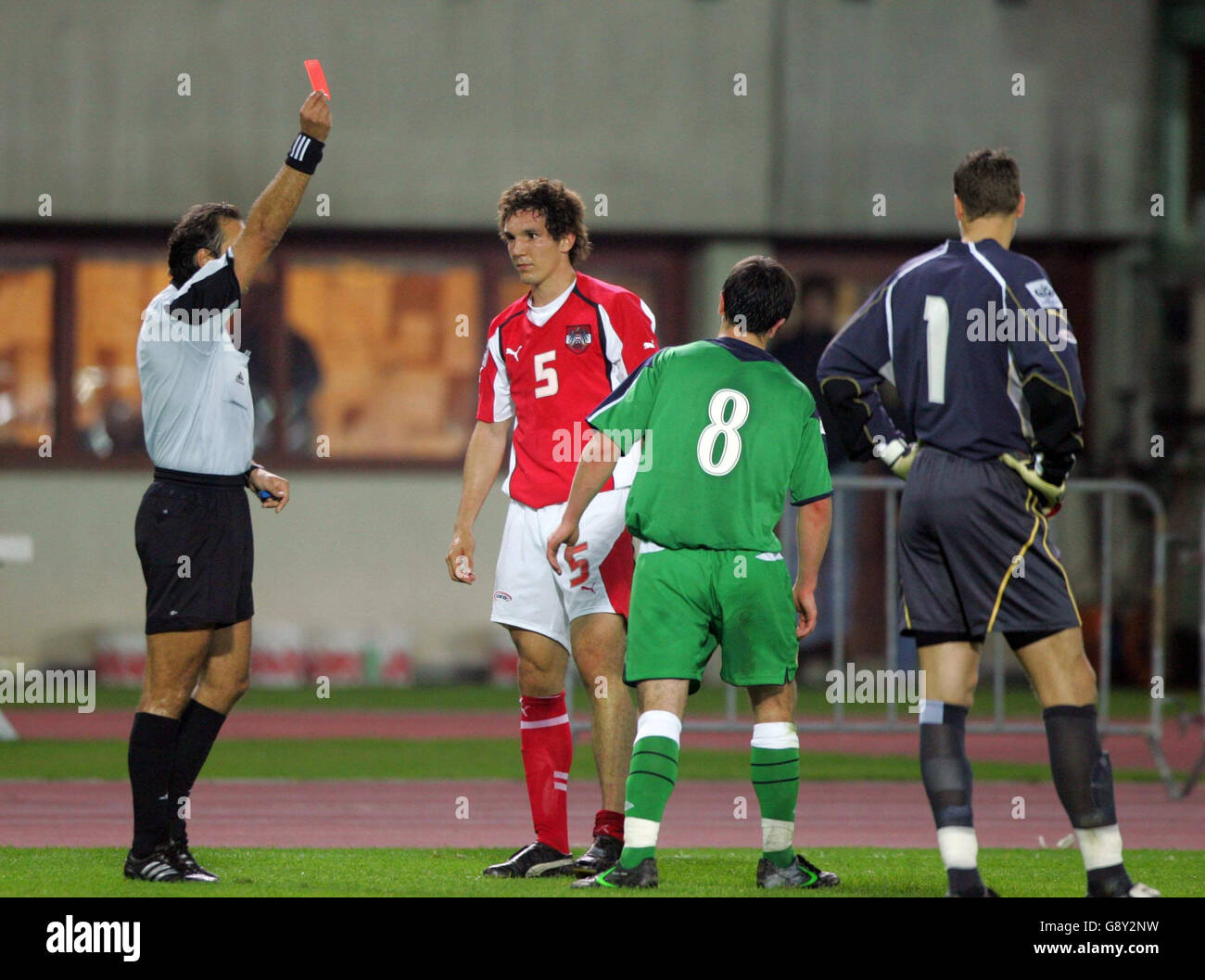 Northern Ireland's Damien Johnson is sent off by referee Athanassios ...