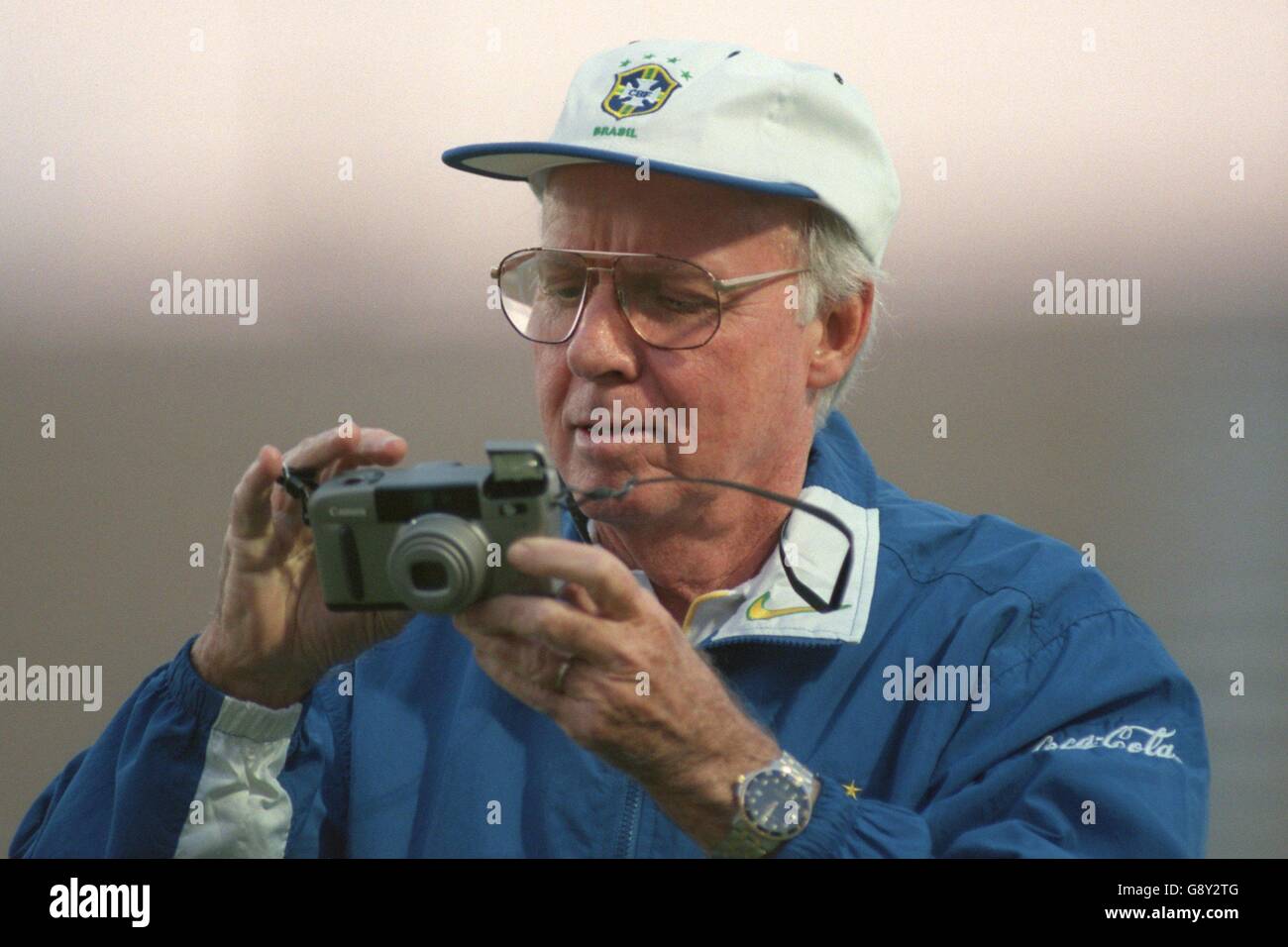 Brazil coach mario zagallo takes photographs during training hi-res ...