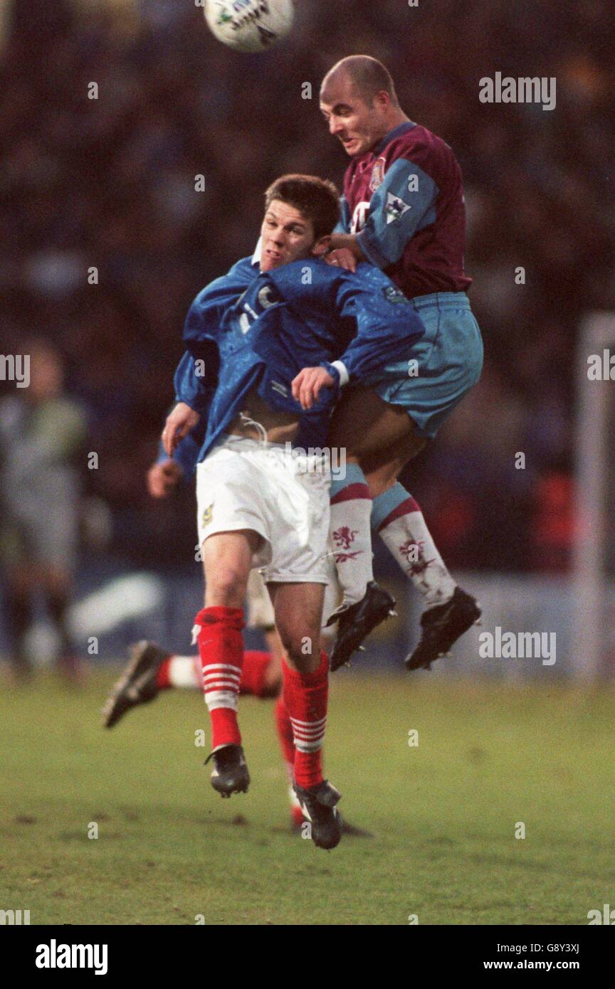 Two action full claret blue header football hi-res stock photography ...