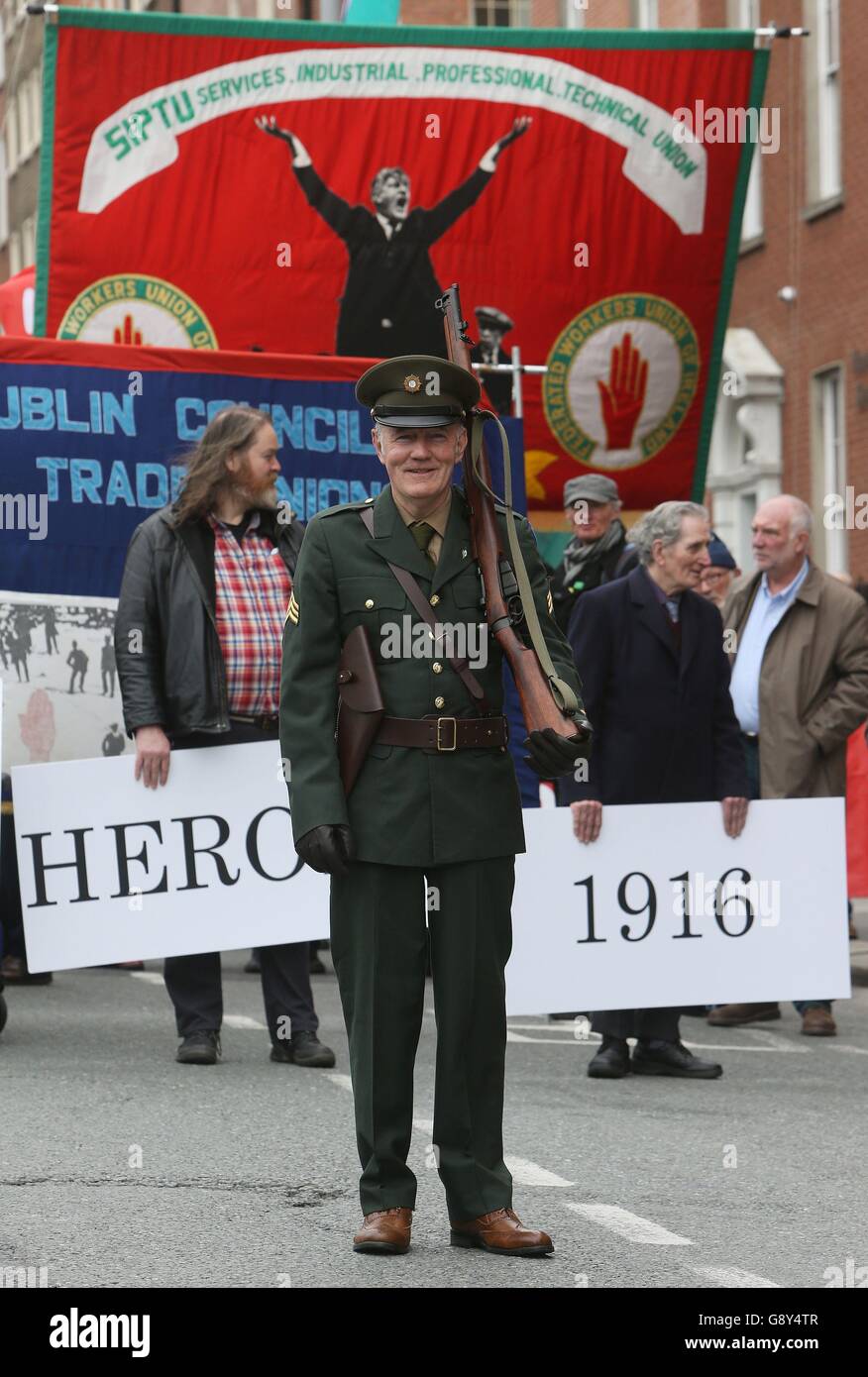 A man dressed in military style uniform takes part in the annual May ...