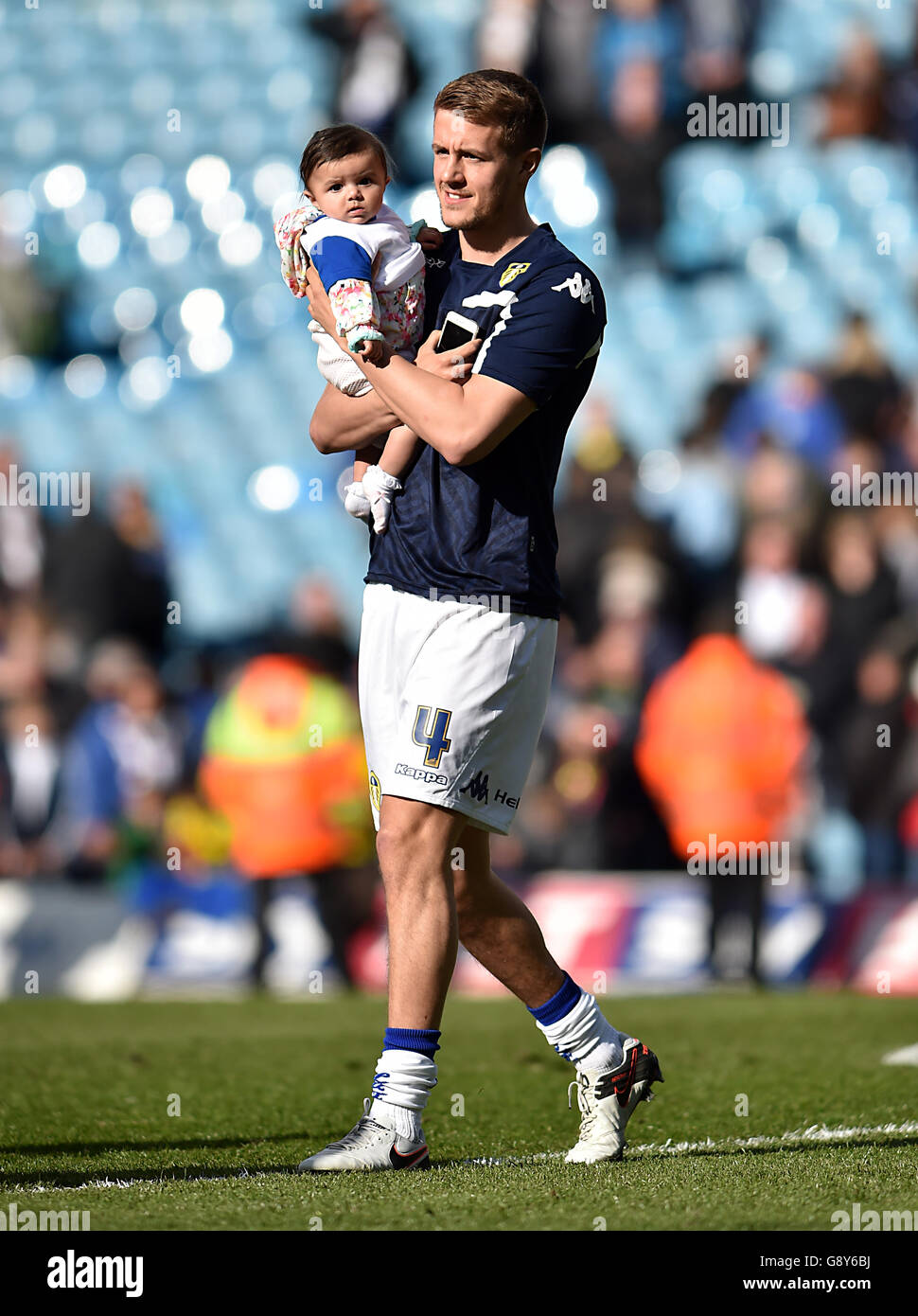 Leeds uniteds scott wootton with child after the match hi-res stock ...